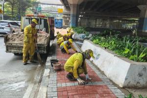 Sidewalk Repairs Underway on Jalan Yos Sudarso